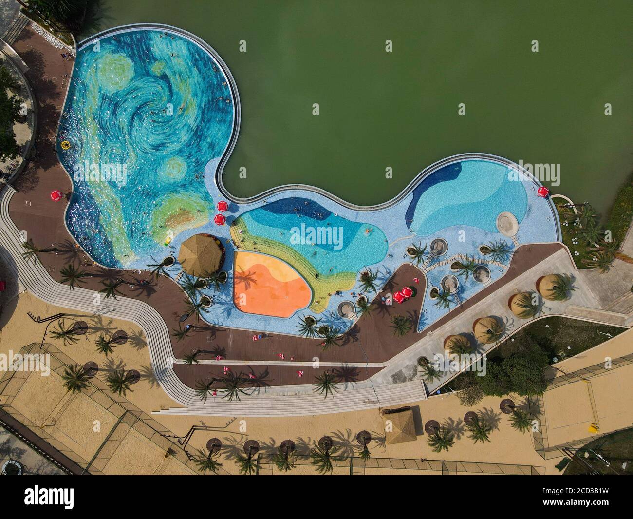 Aerial view of Sichuan's biggest outdoor swimming pool that is paved ...