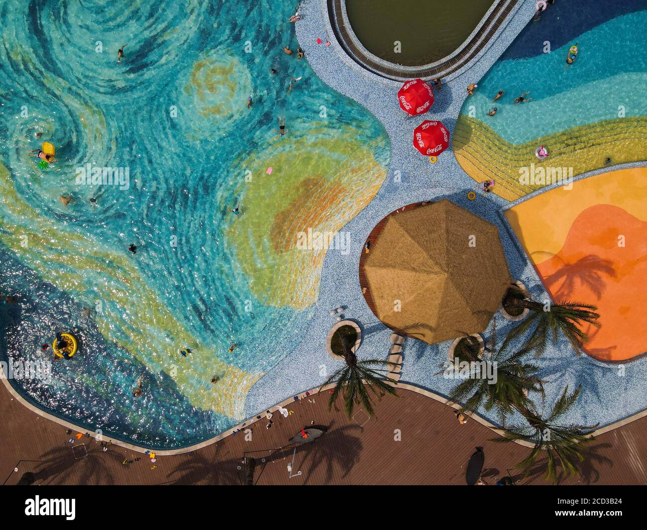 Aerial view of Sichuan's biggest outdoor swimming pool that is paved ...