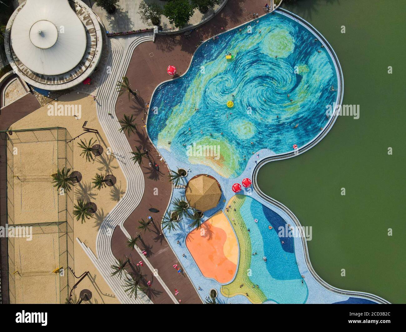 Aerial view of Sichuan's biggest outdoor swimming pool that is paved ...