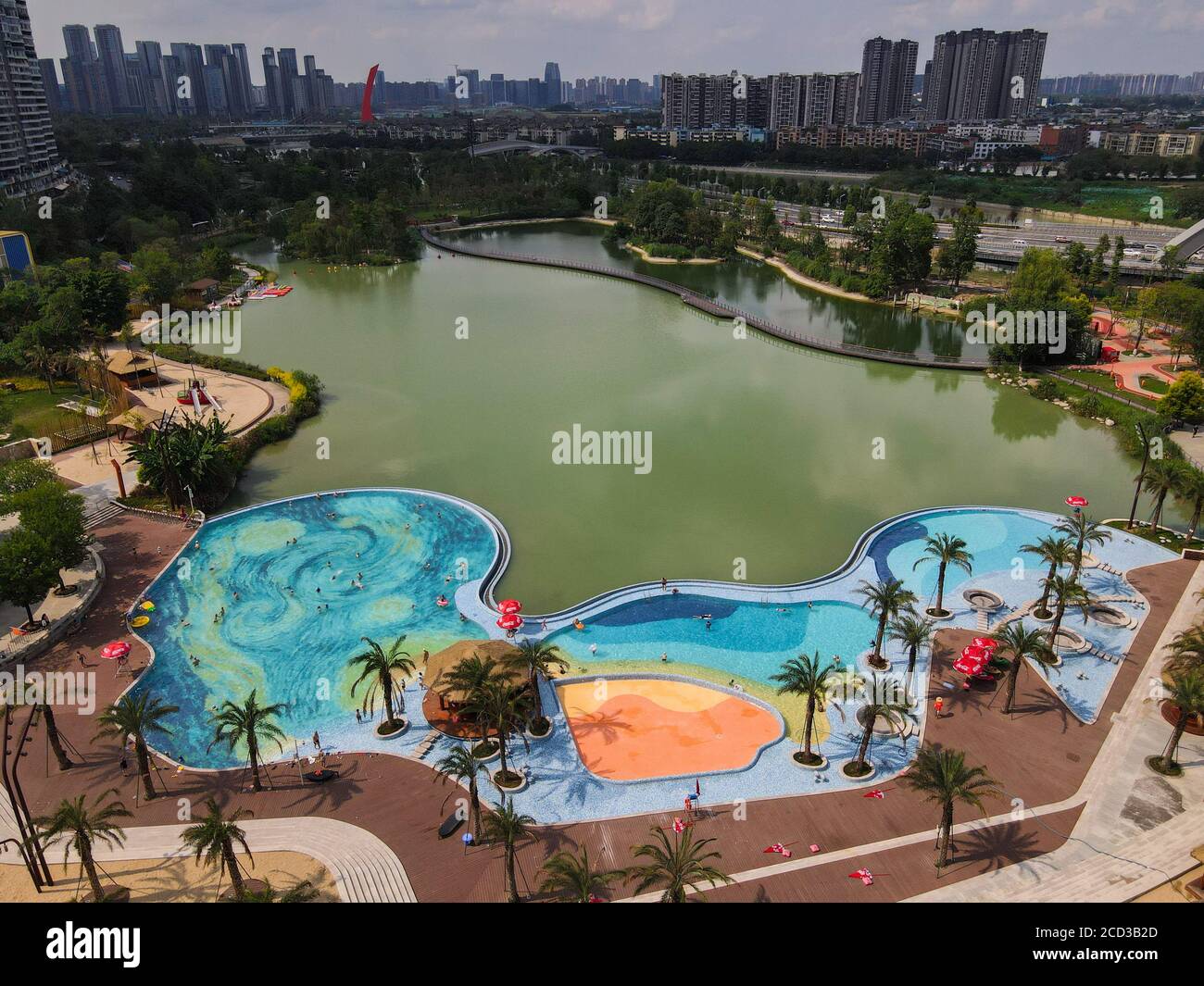 Aerial view of Sichuan's biggest outdoor swimming pool that is paved ...