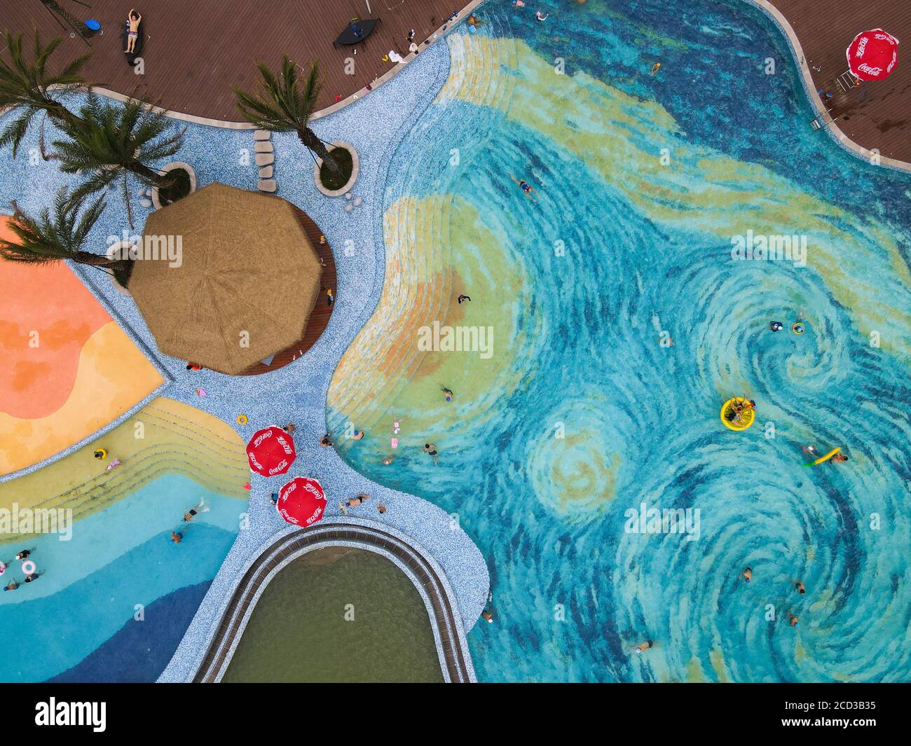 Aerial view of Sichuan's biggest outdoor swimming pool that is paved ...