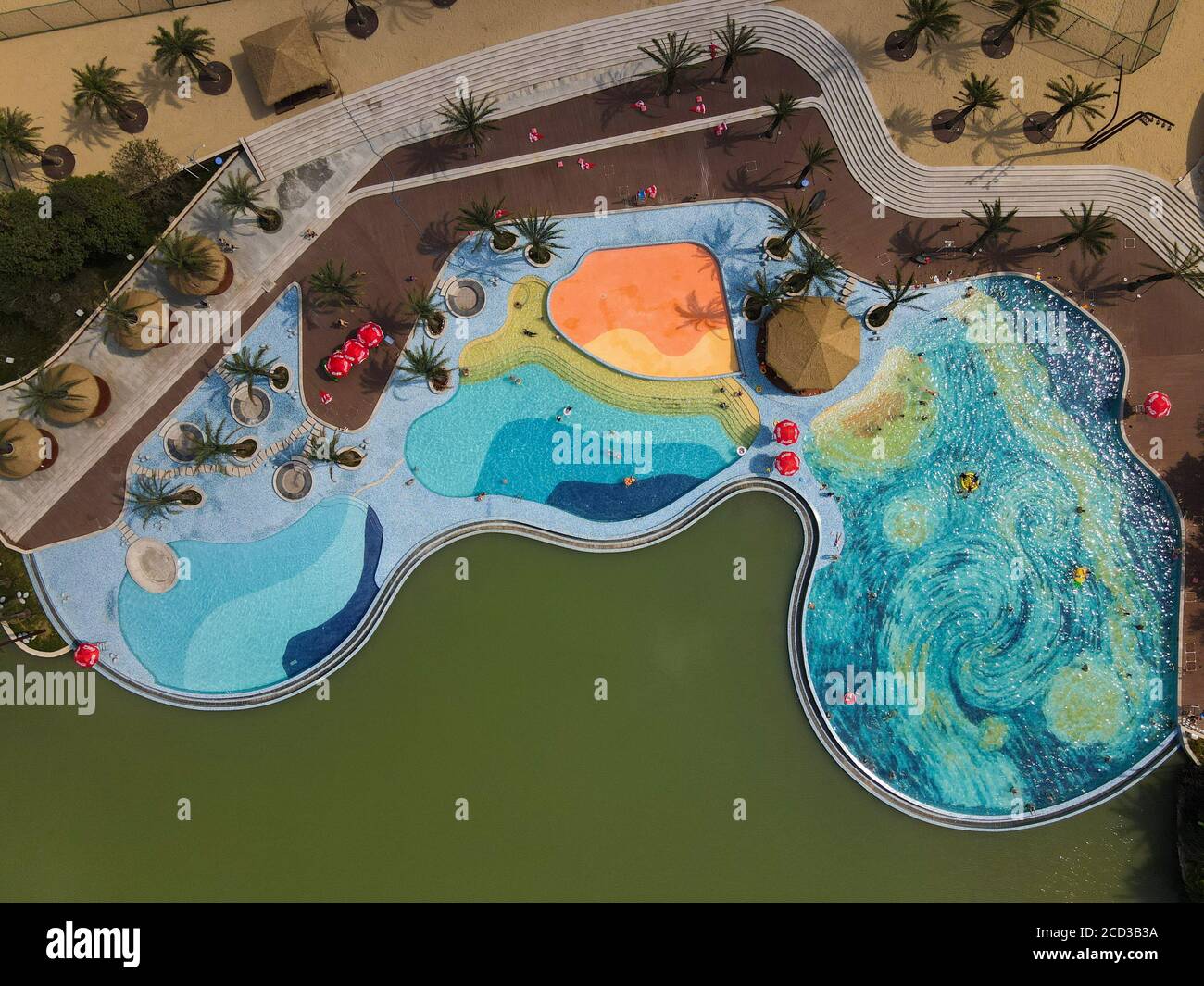 Aerial view of Sichuan's biggest outdoor swimming pool that is paved ...