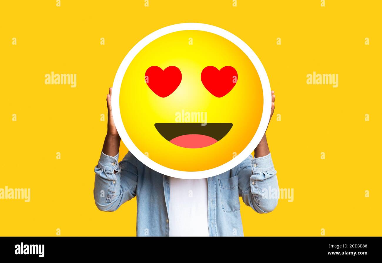 I Love Emoji. Unrecognizable Black Man Hiding Face Against Romantic ...