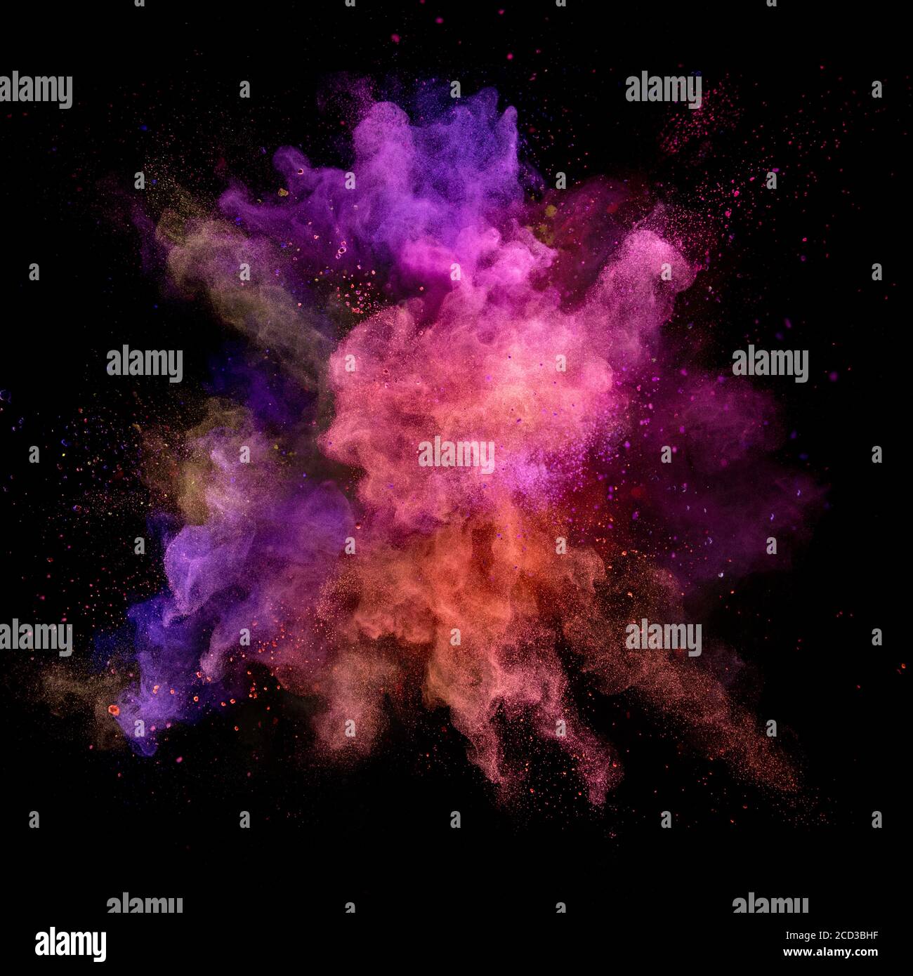 Explosion of coloured powder isolated on black background Stock Photo ...