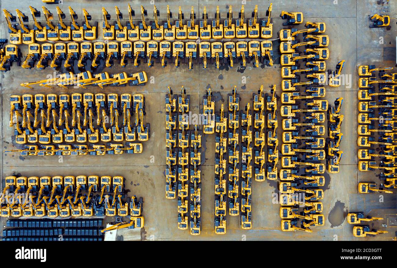 An aerial view of arrays of excavators at a factory of Chinese ...