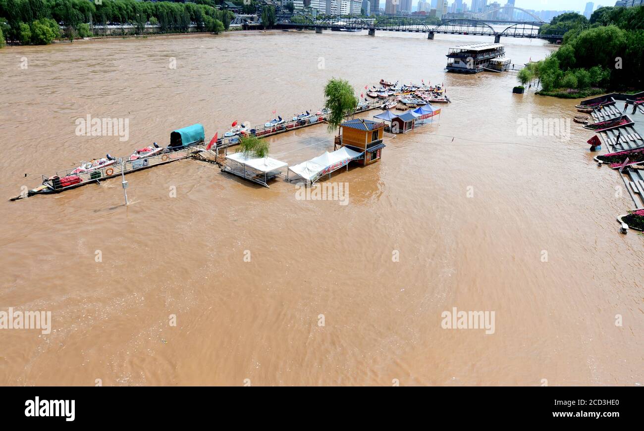 Water rises near Zhongshan Bridge in Lanzhou city, northwest China's ...