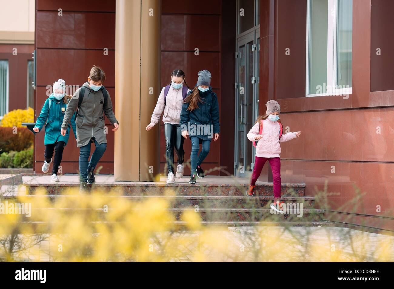 Group schoolchildren in medical masks hi-res stock photography and ...
