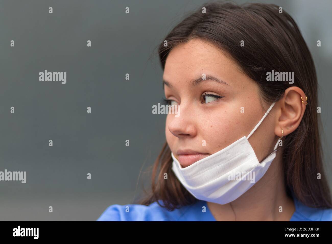 A young nurse takes a break from her mask Stock Photo - Alamy
