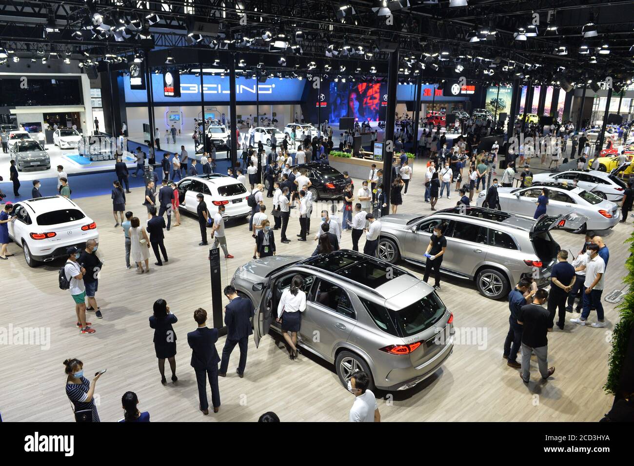 People walk around to look at the cars exhibited the 2020 Chengdu Motor ...