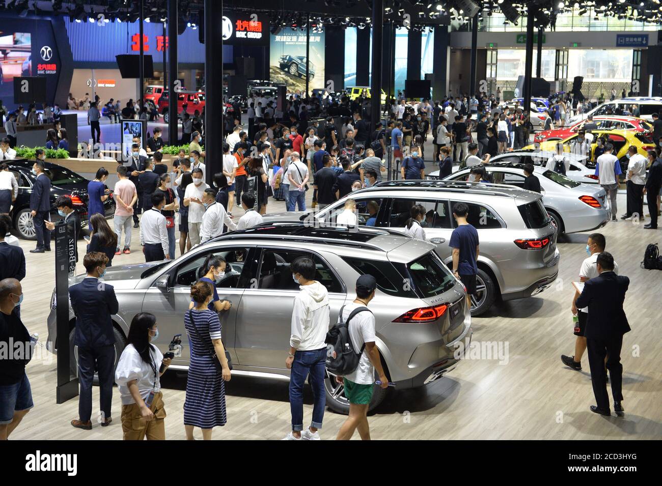 People walk around to look at the cars exhibited the 2020 Chengdu Motor ...
