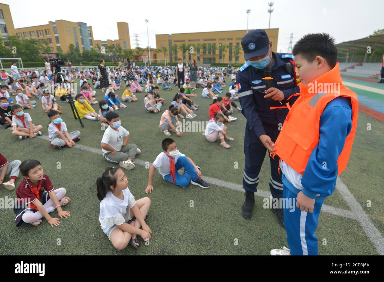 Students at a local primary school take a drowning prevention activity ...