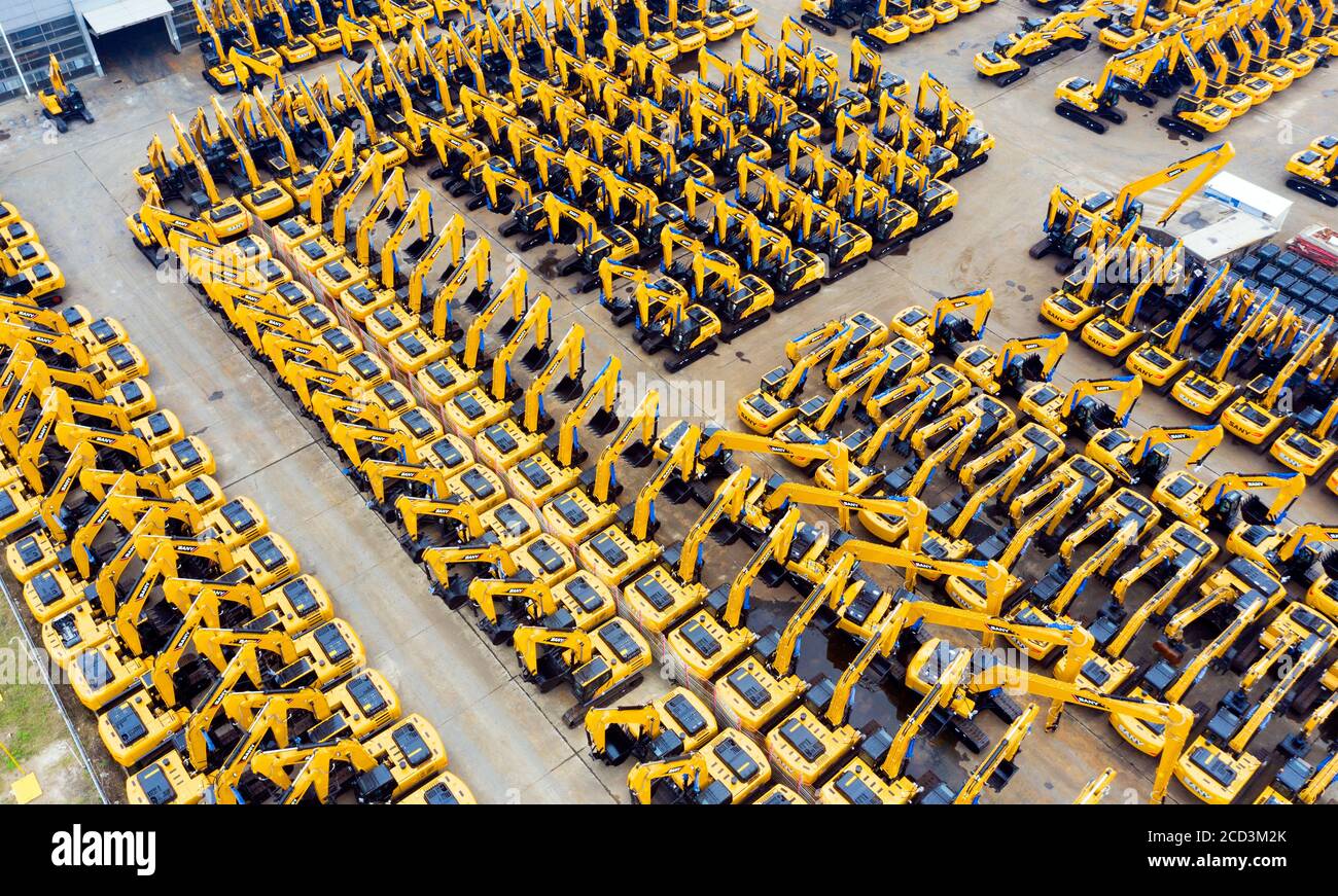 An aerial view of arrays of excavators at a factory of Chinese ...