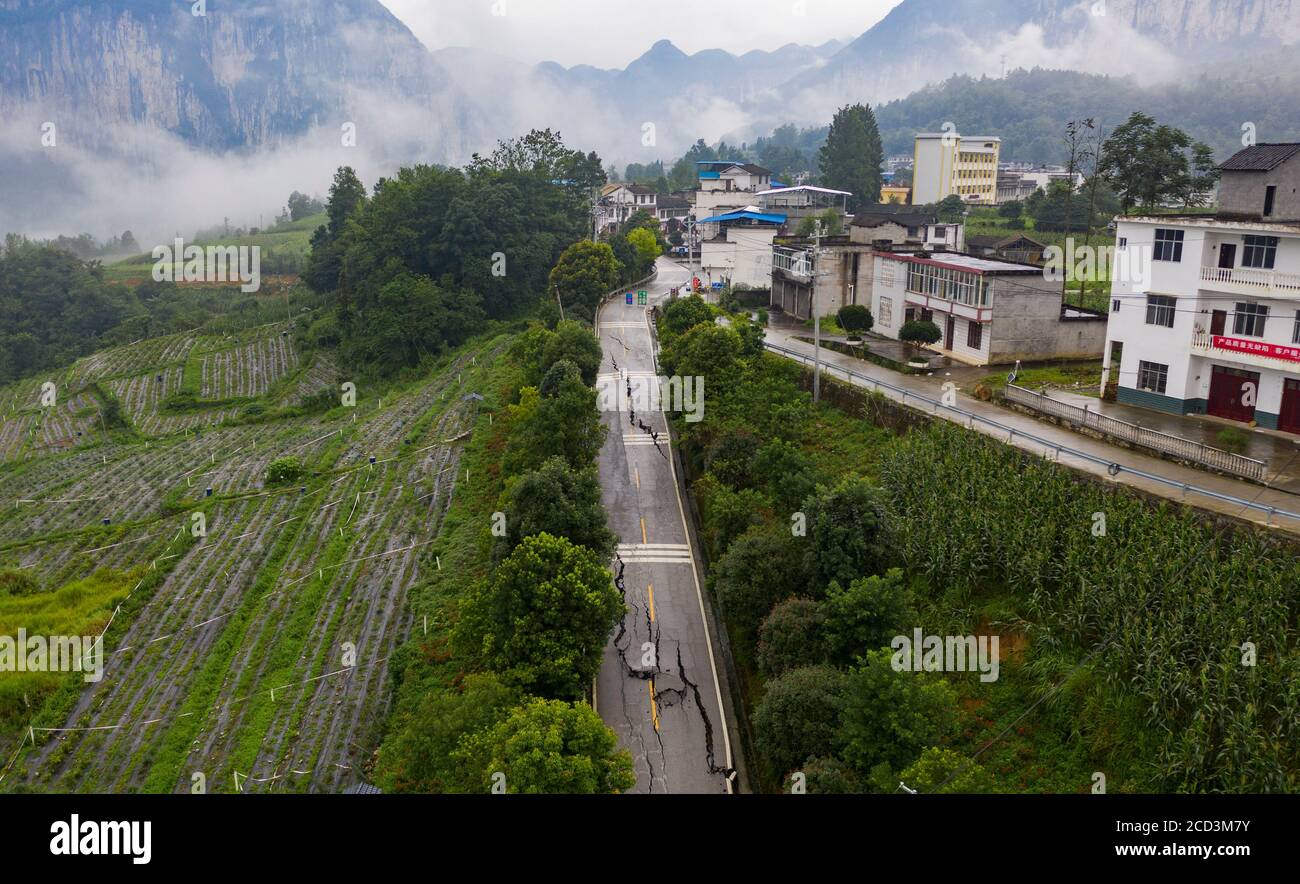 Aerial view of a road cracking due to landslide caused by flood in ...