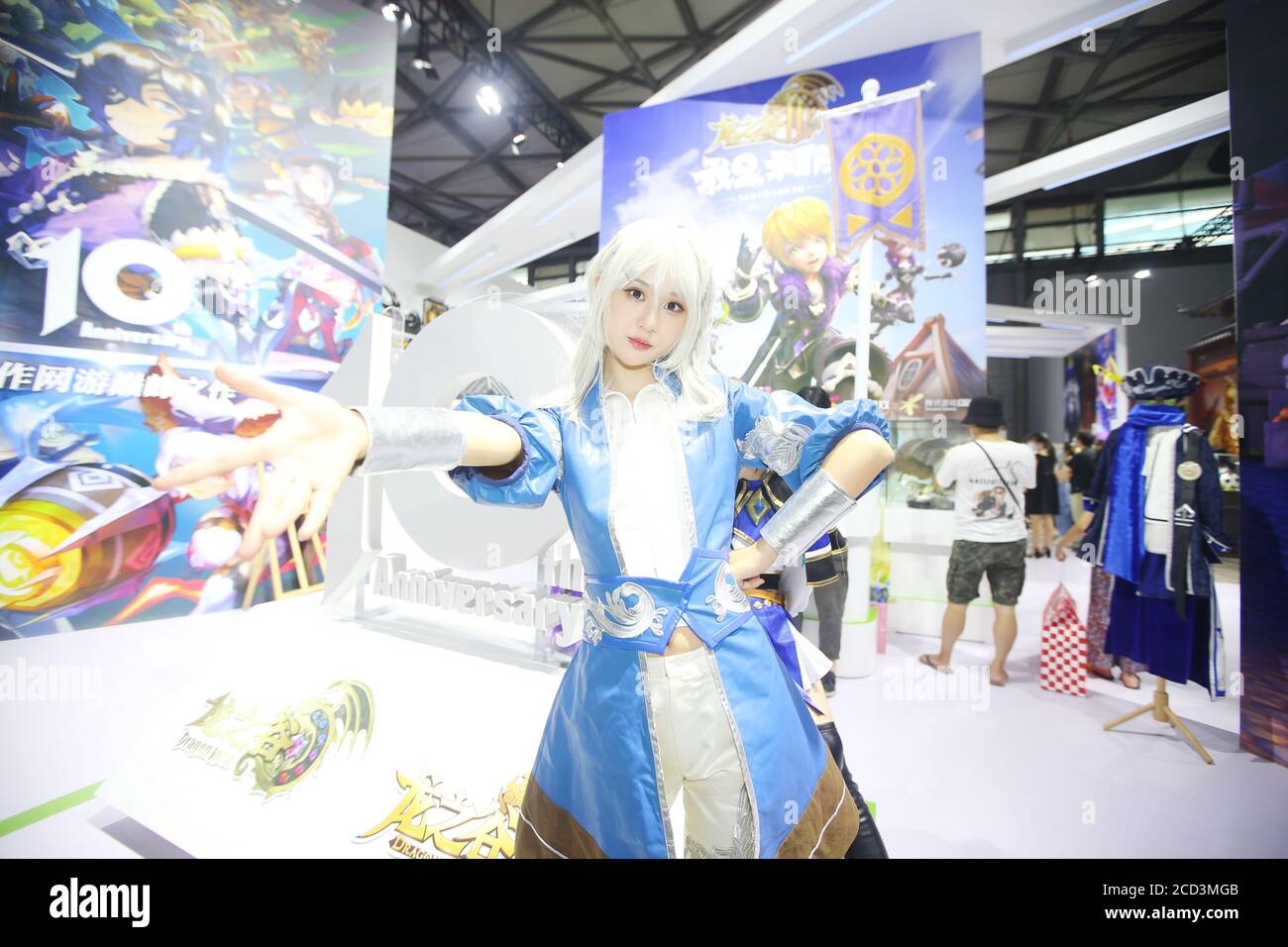 Beautiful cosplayers are seen posing and performing in clotThes shown ...