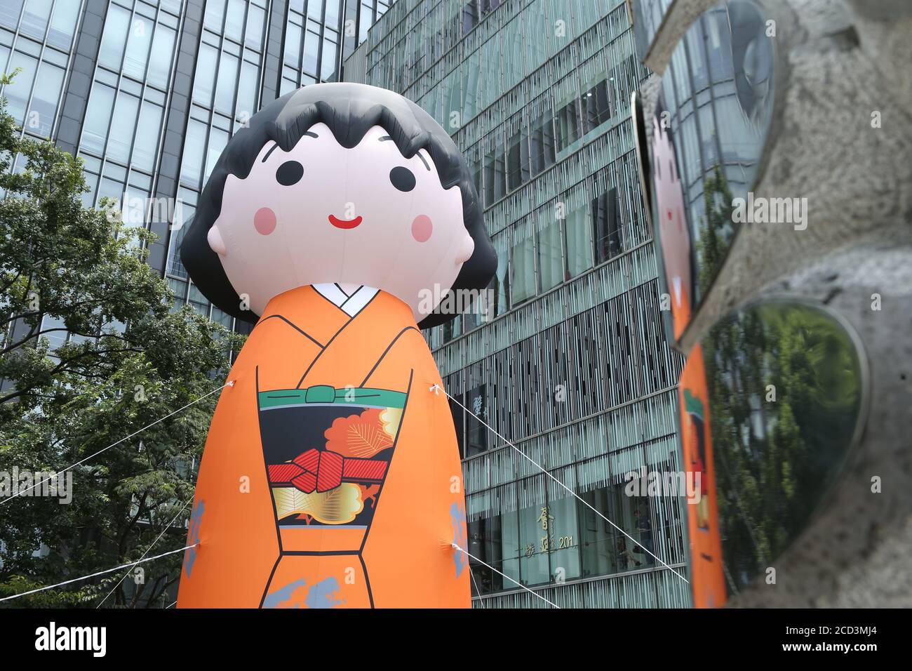 A giant balloon of Chi-bi Maruko is pictured in front of a shopping ...