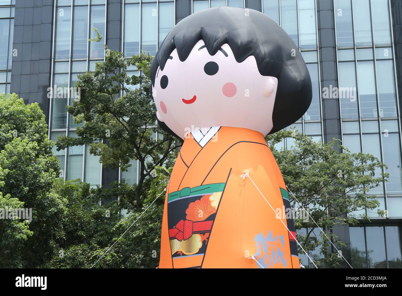 A giant balloon of Chi-bi Maruko is pictured in front of a shopping ...