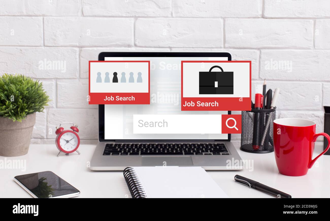 Laptop on the desk with job search engine on display Stock Photo - Alamy