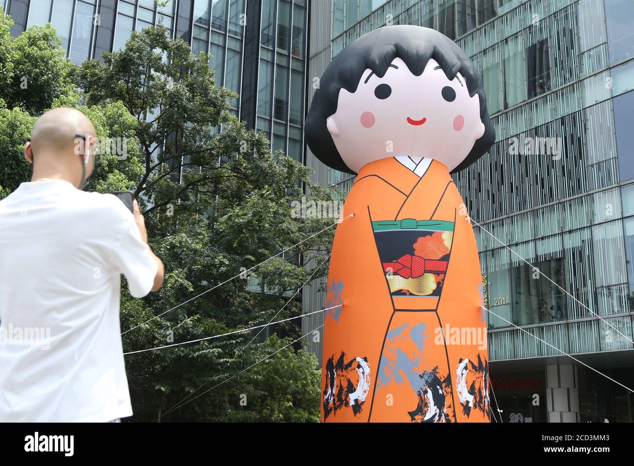 A giant balloon of Chi-bi Maruko is pictured in front of a shopping ...