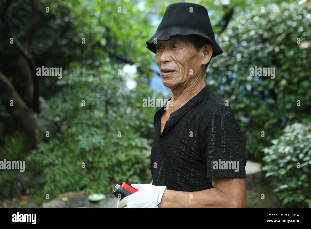 Mr. Jiang, a man in his seventies, practices Yoga in a special way, standing upside down with ...