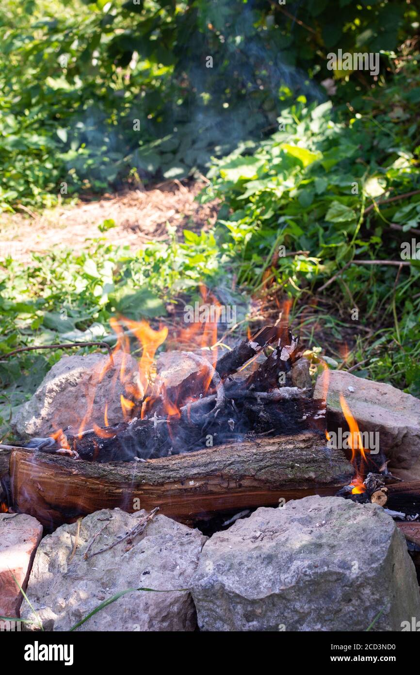 Man making fire stones hi-res stock photography and images - Alamy
