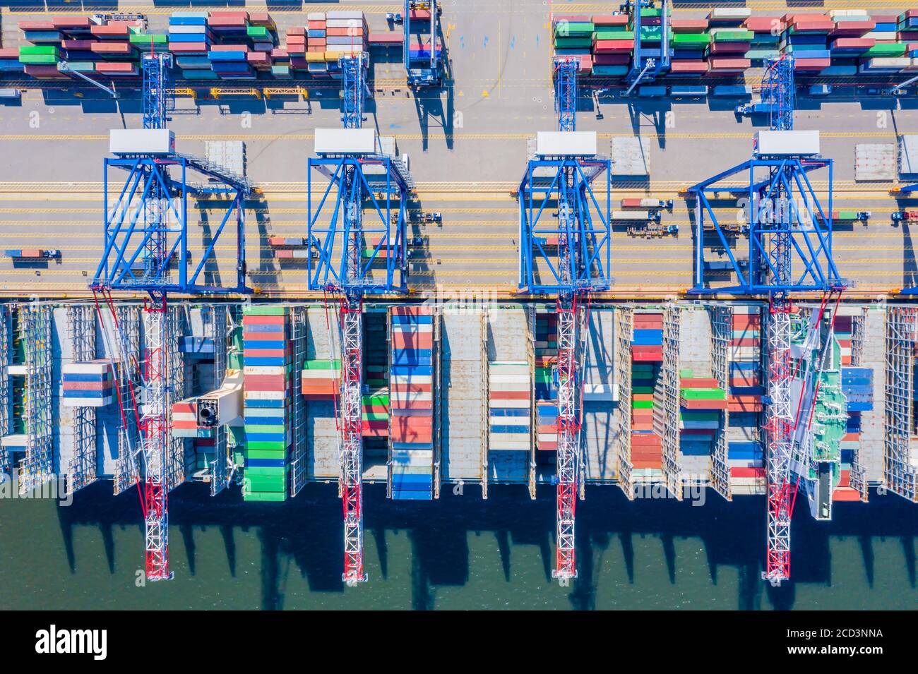 Container ship loading at port with crane, container ship carrying ...