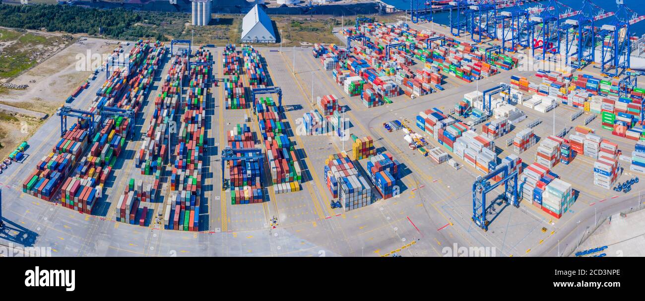 Container ship loading at port with crane, container ship carrying ...