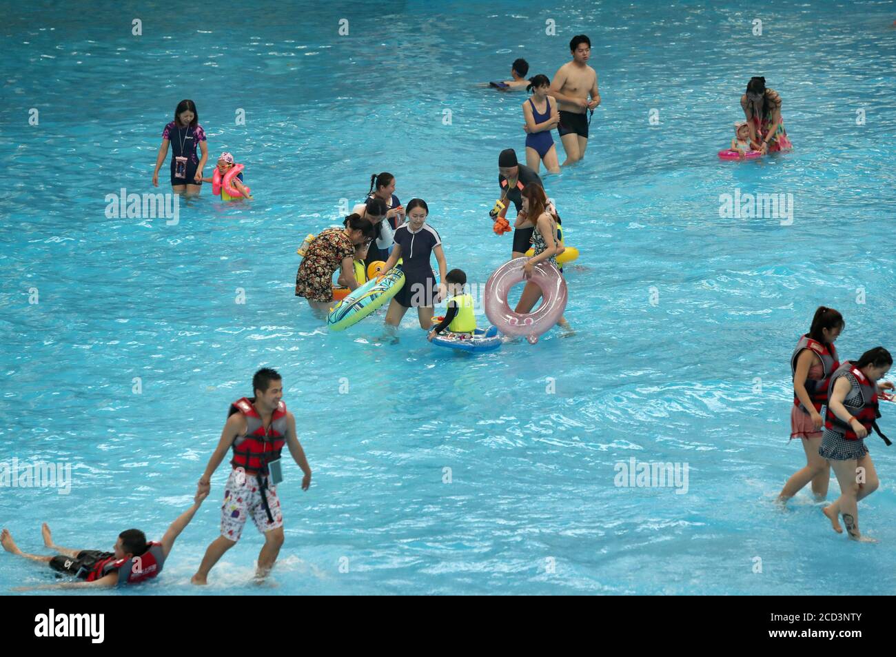 Citizens enjoy water and various aquatic activities to relieve from scorching summer heat as the ...