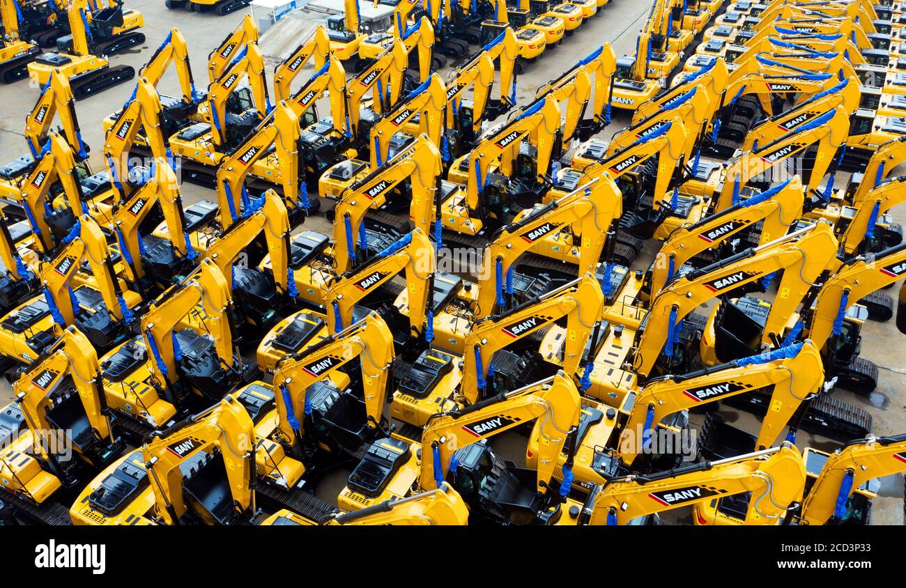 An aerial view of arrays of excavators at a factory of Chinese ...