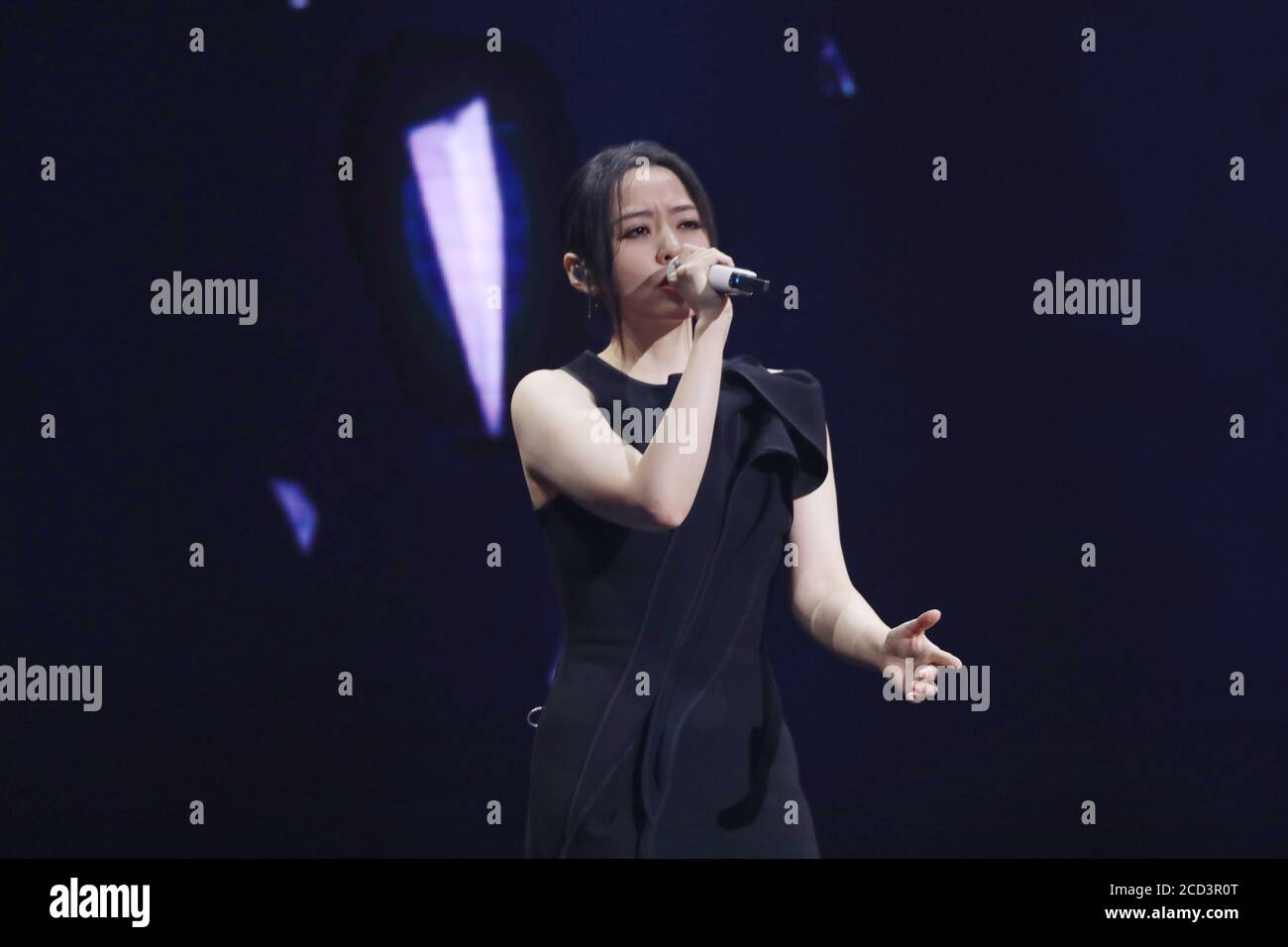Chinese singer-songwriter Jane Zhang performs at the Chinese Top Ten ...