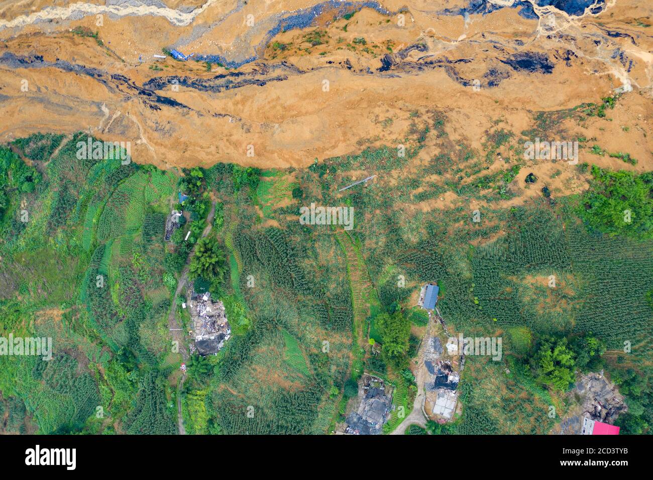 Aerial view of Qingjiang River turning into yellow due to landslide ...