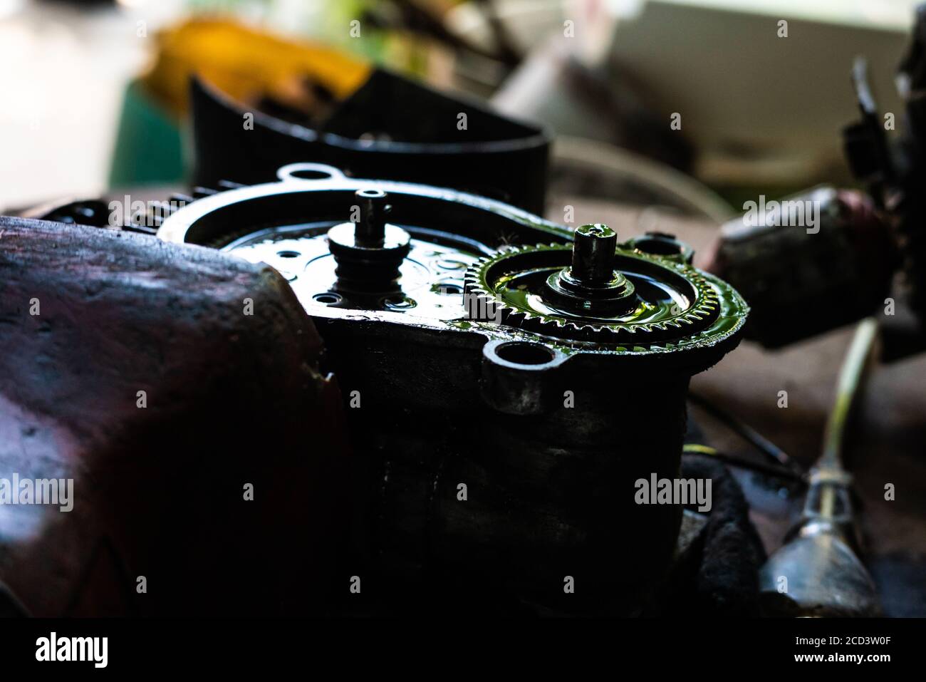 Car engine gear fix with engine oil close up Stock Photo - Alamy