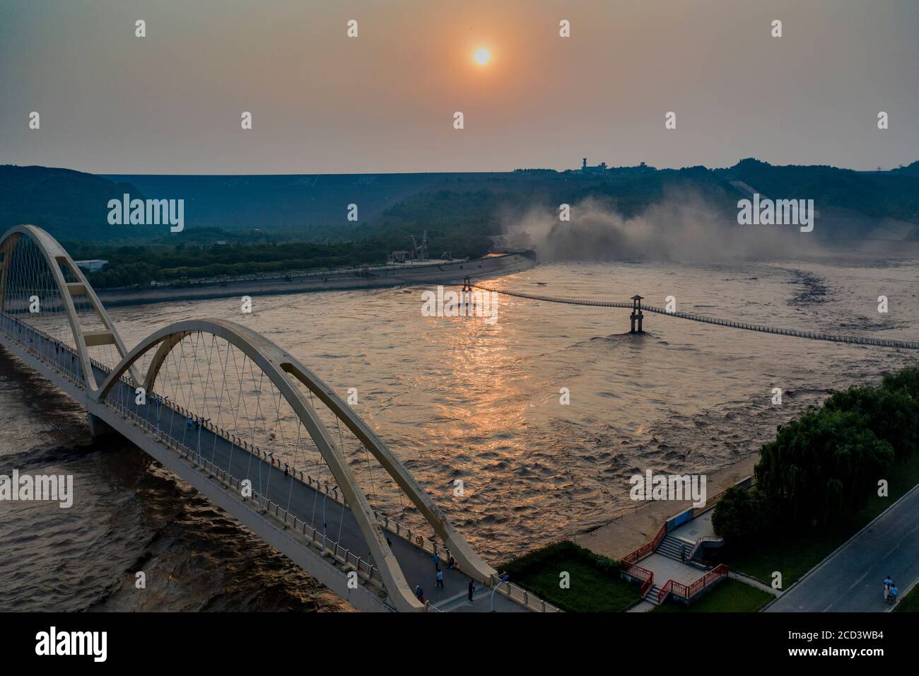 Aerial view of Xiaolangdi Dam discharging flood and sand after days of ...