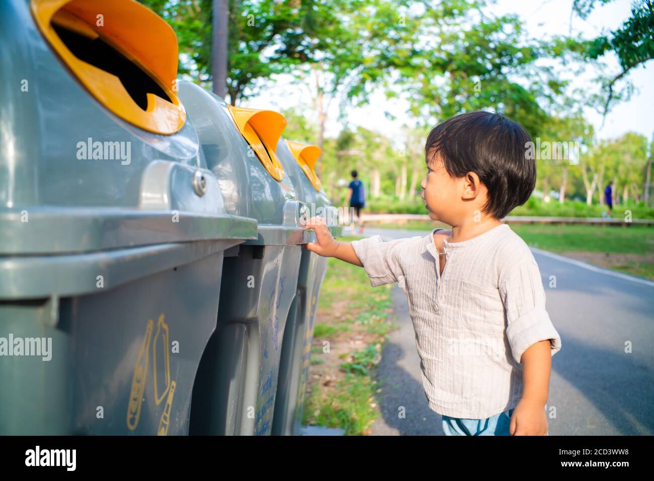 Child Trash In The Bin High Resolution Stock Photography and Images - Alamy