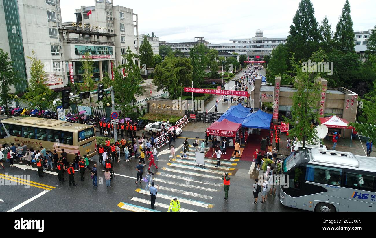 An aerial view of students walking outside a testing center after today ...