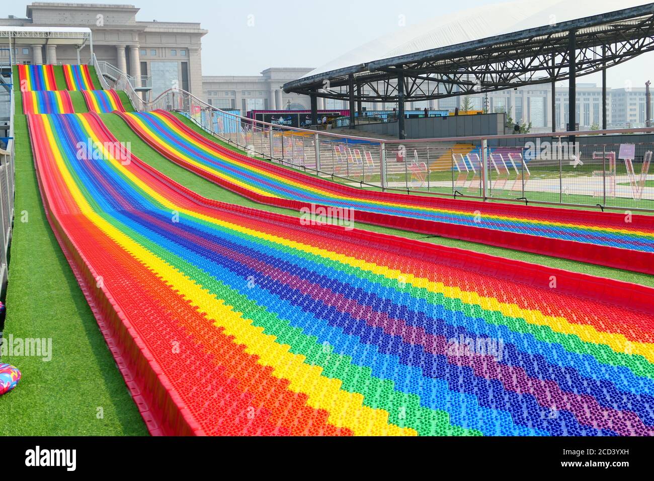 People experience the new rainbow slide at the Wukesong Adventure Park ...
