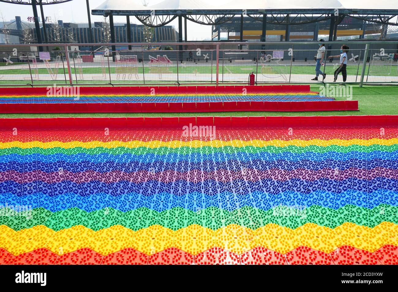People experience the new rainbow slide at the Wukesong Adventure Park ...