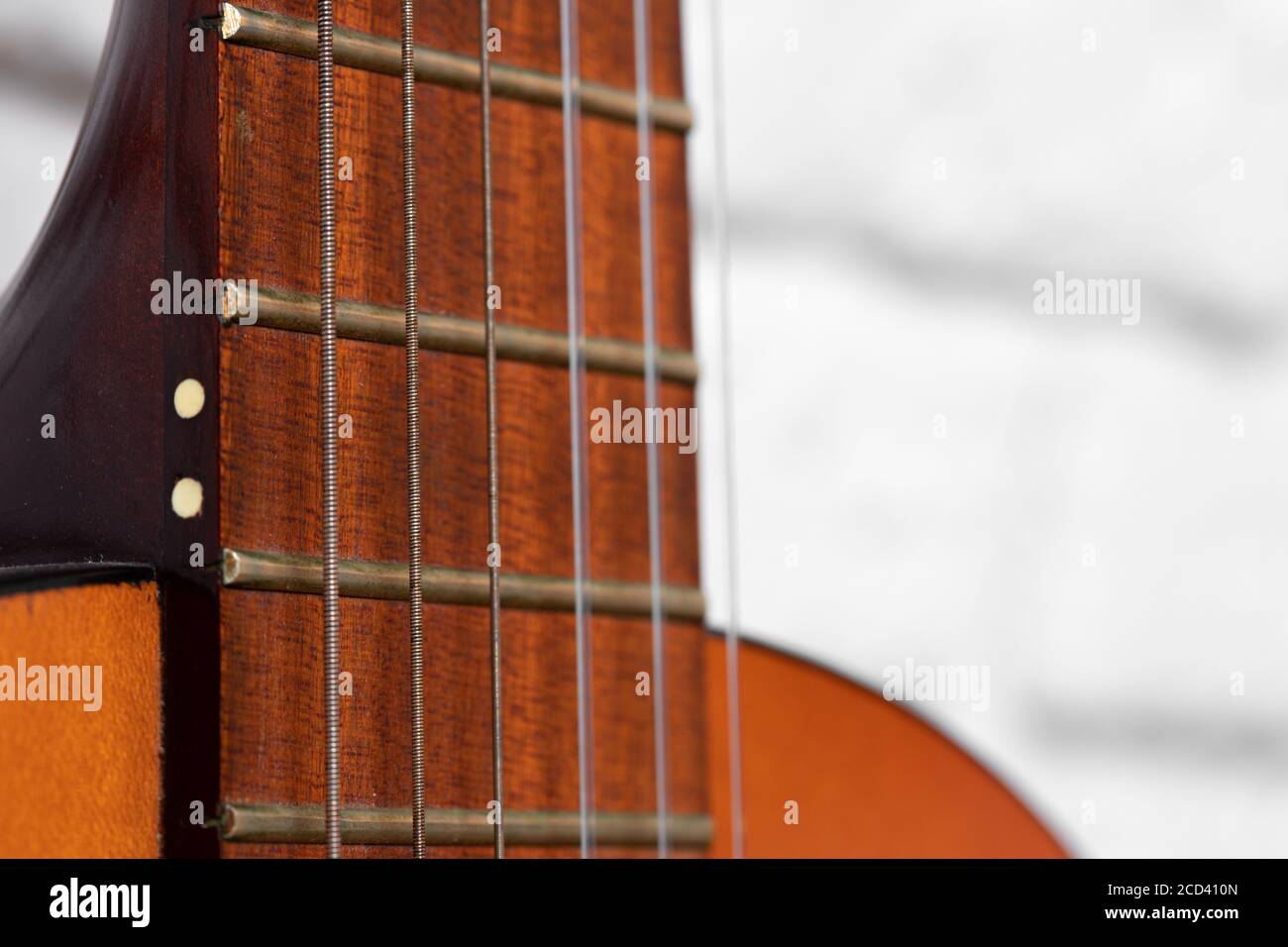 Guitar fingerboard with strings close up photo Stock Photo - Alamy