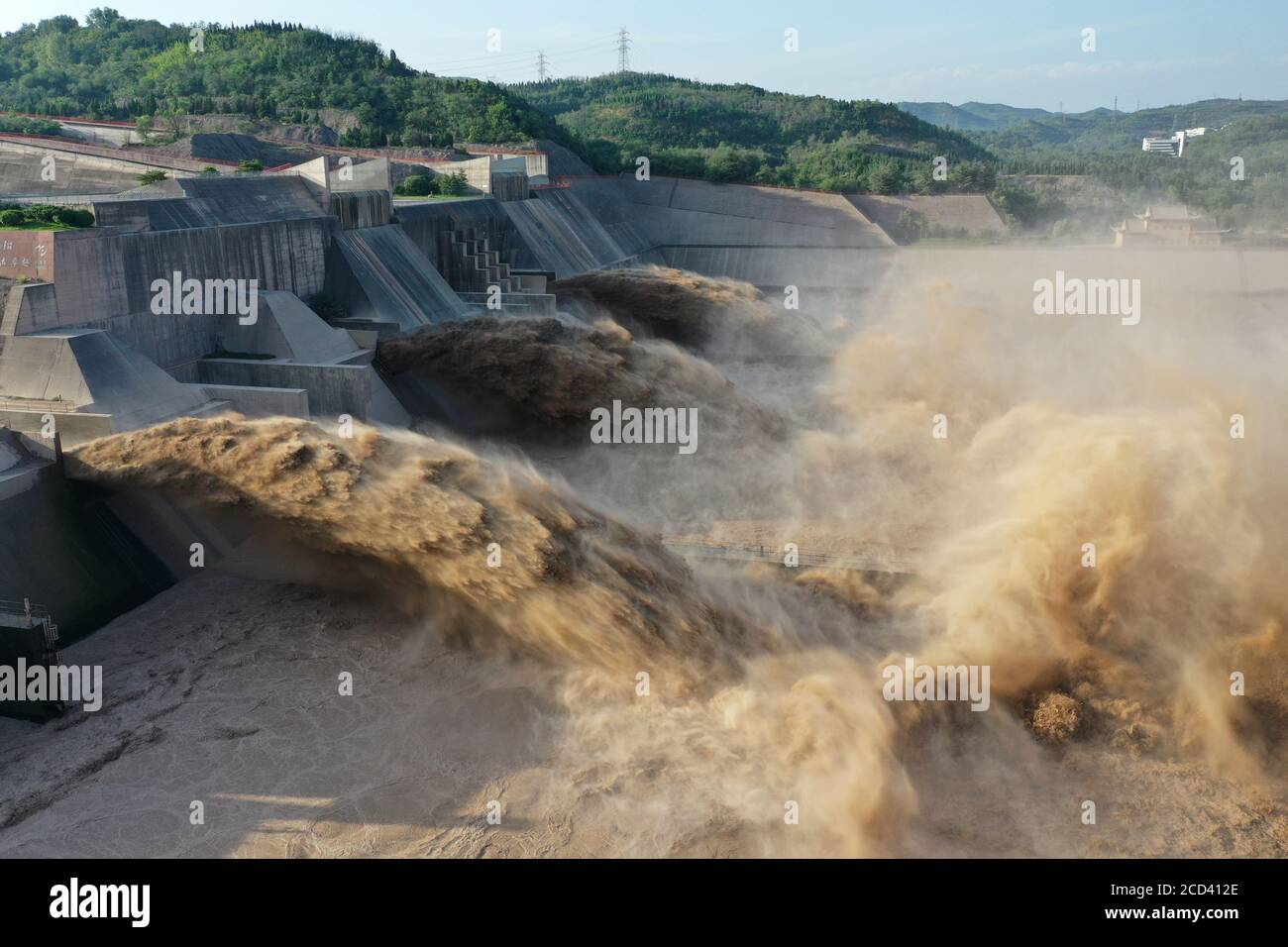 Aerial view of Xiaolangdi Dam discharging flood and sand after days of ...