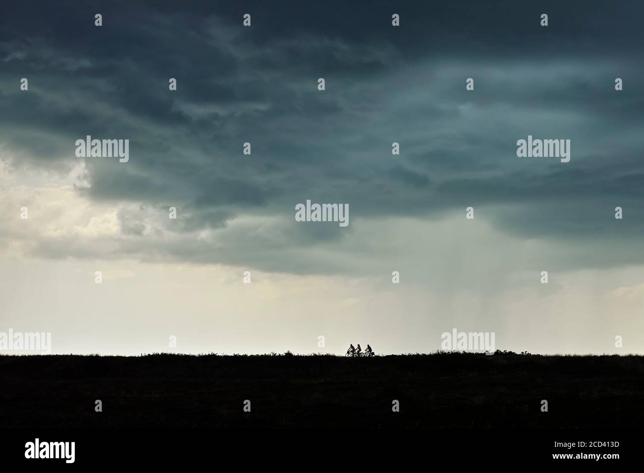 Black clouds over field landscape hi-res stock photography and images ...