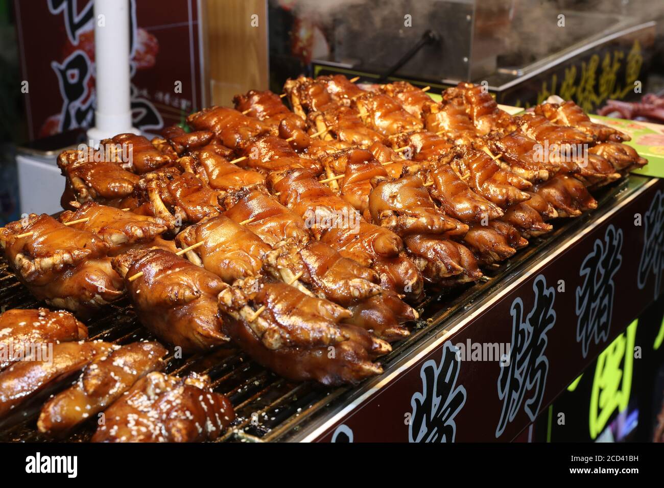 Tourists crowd at Zengcuoan, a local tourist spot famous for its night ...