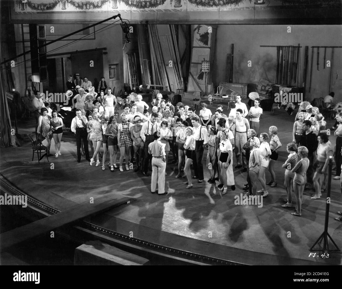 UNA MERKEL GINGER ROGERS TOBY WING DICK POWELL RUBY KEELER and GEORGE E. STONE on set candid ...