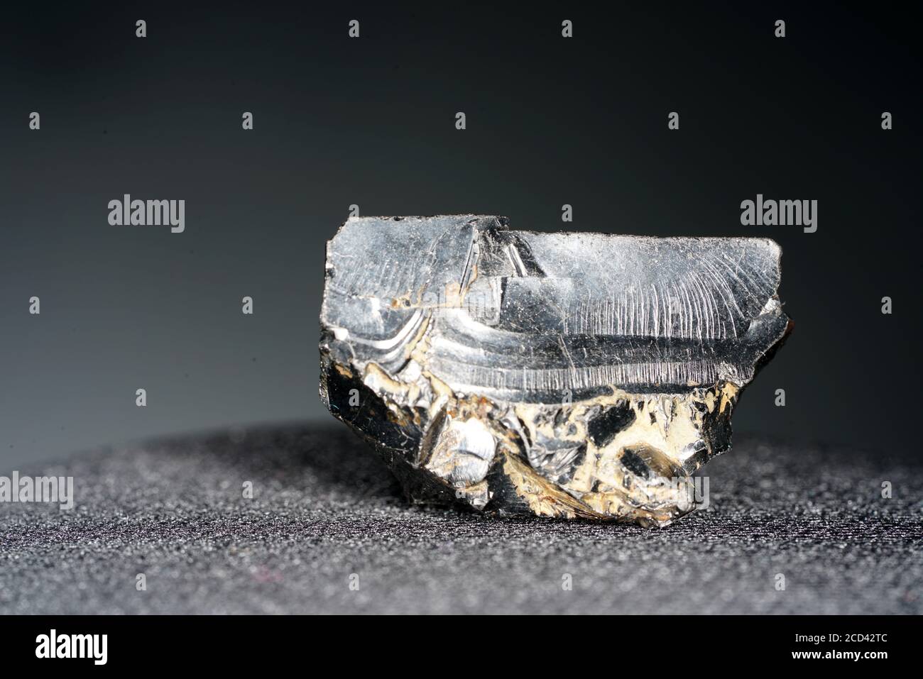 Black rock also called healing stone shungite Stock Photo - Alamy