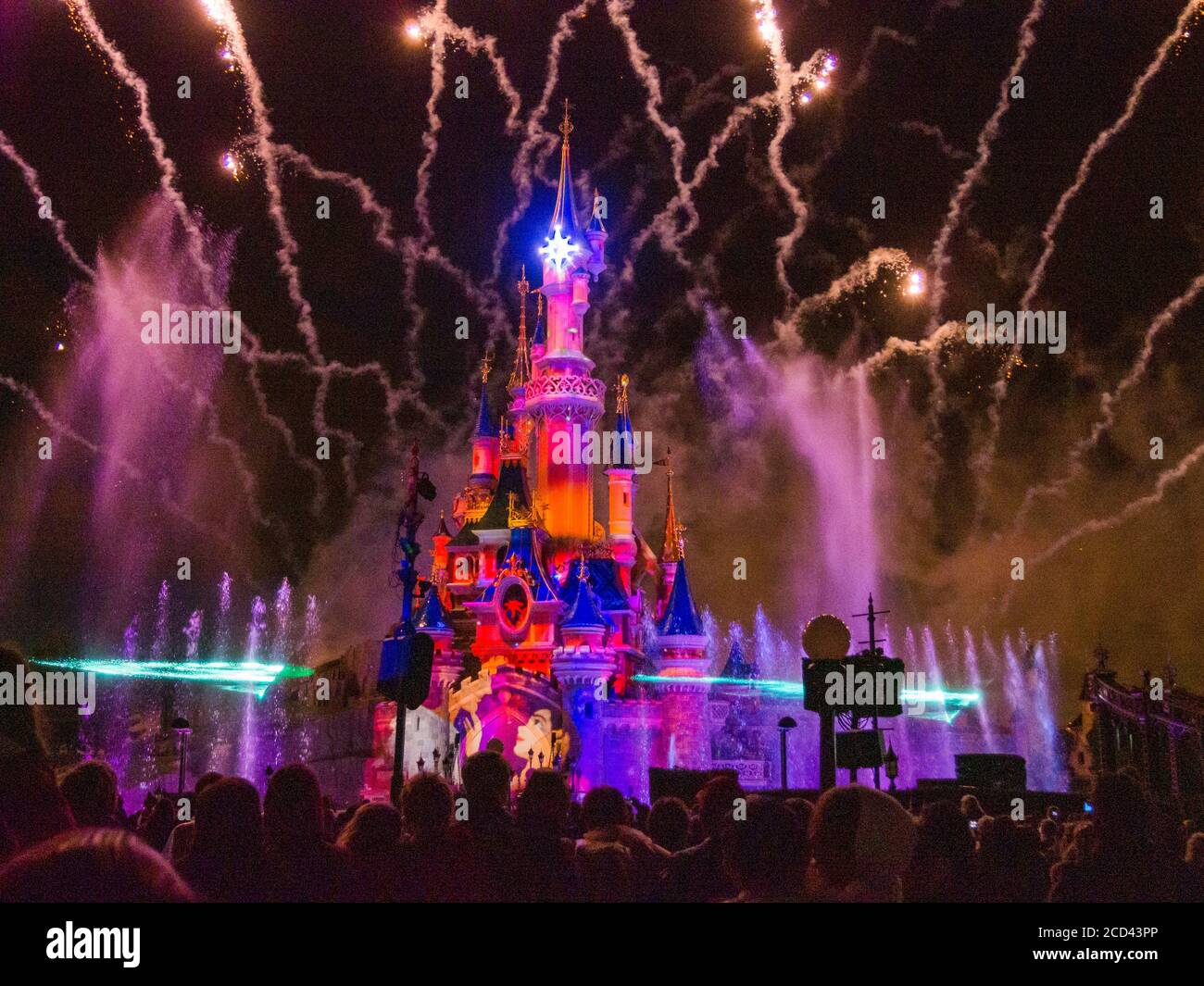 Disneyland Paris, castle with fireworks Stock Photo - Alamy