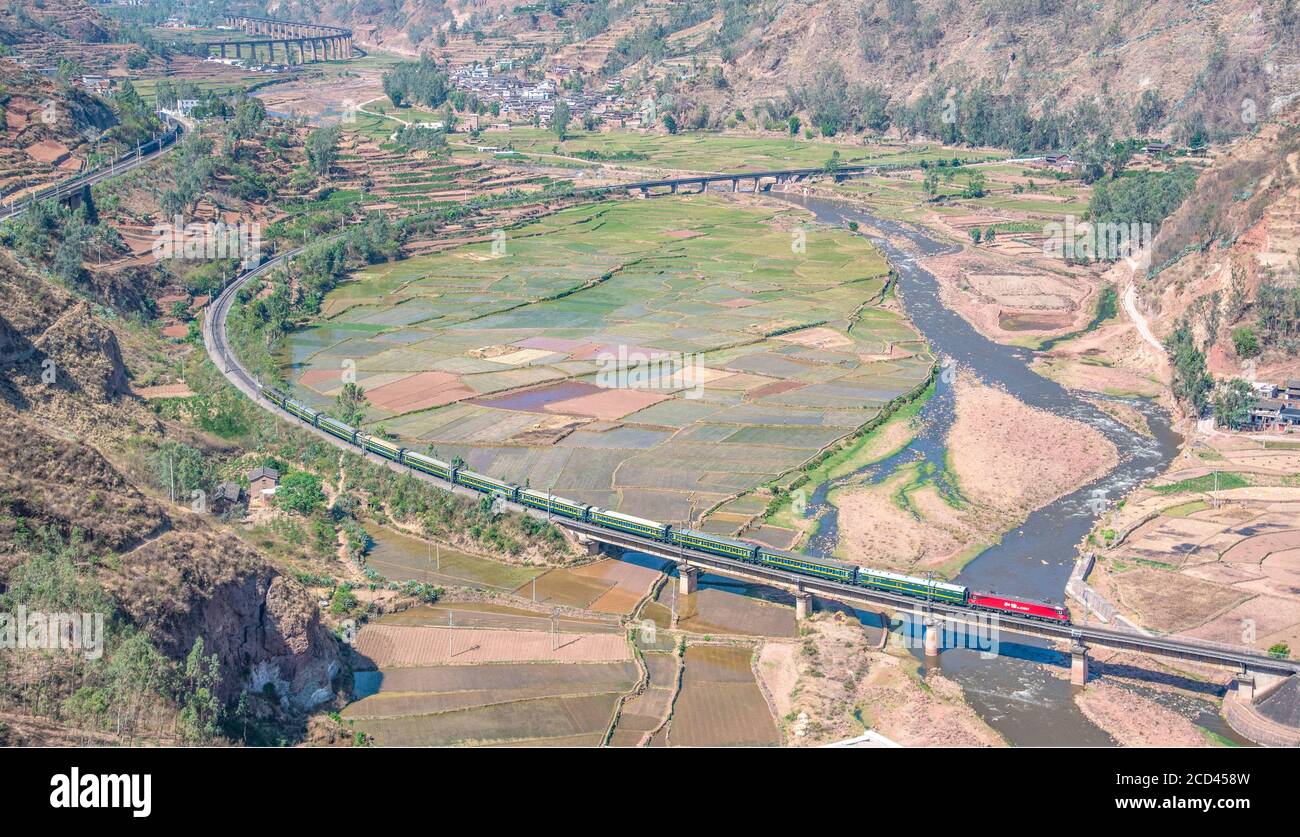 --FILE--A train runs on the Chengdu-Kunming Railway, which connects ...