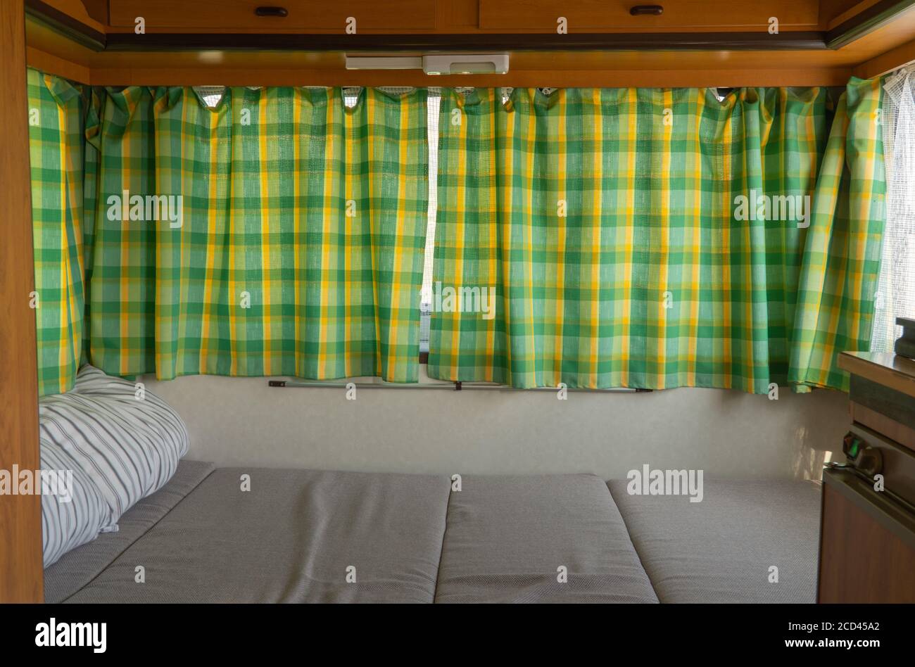folding bed inside the trailer. camper van interior. caravan trailer of ...