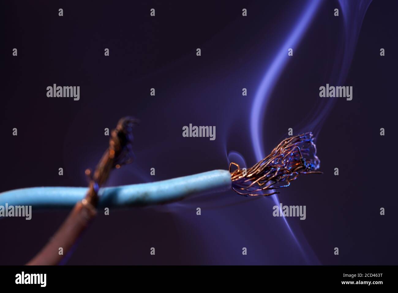 Selective focus shot of wires soldering with blue smoke Stock Photo - Alamy