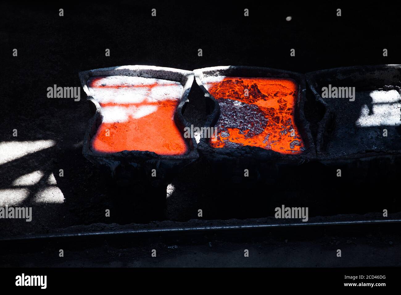 Liquid red hot metal in metallurgy bucket. Metallurgical factory ...