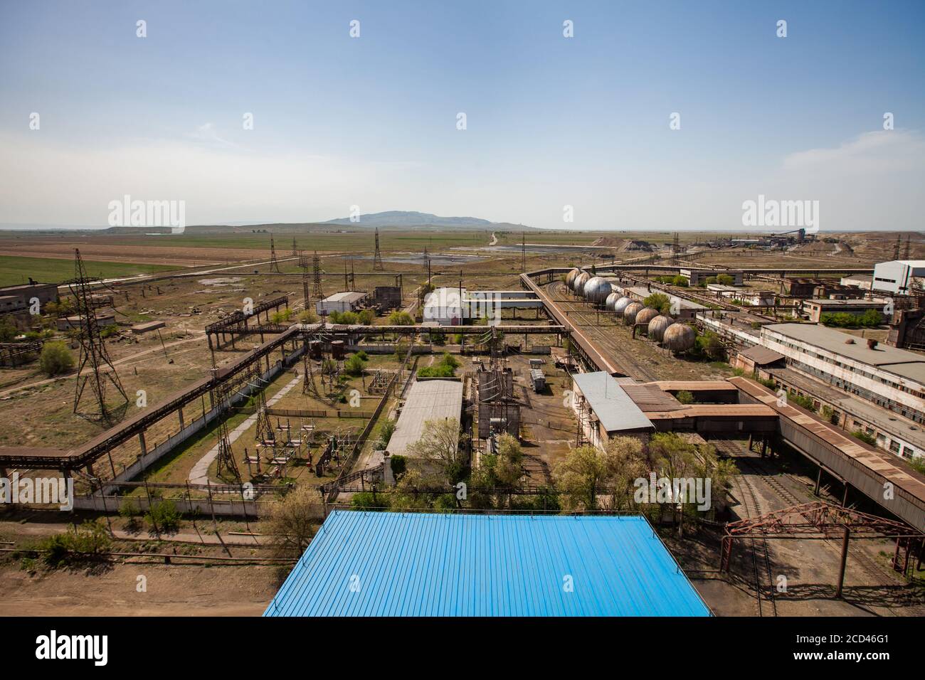 Old outdated soviet metallurgy plant. Factory buildings, rusted gas ...
