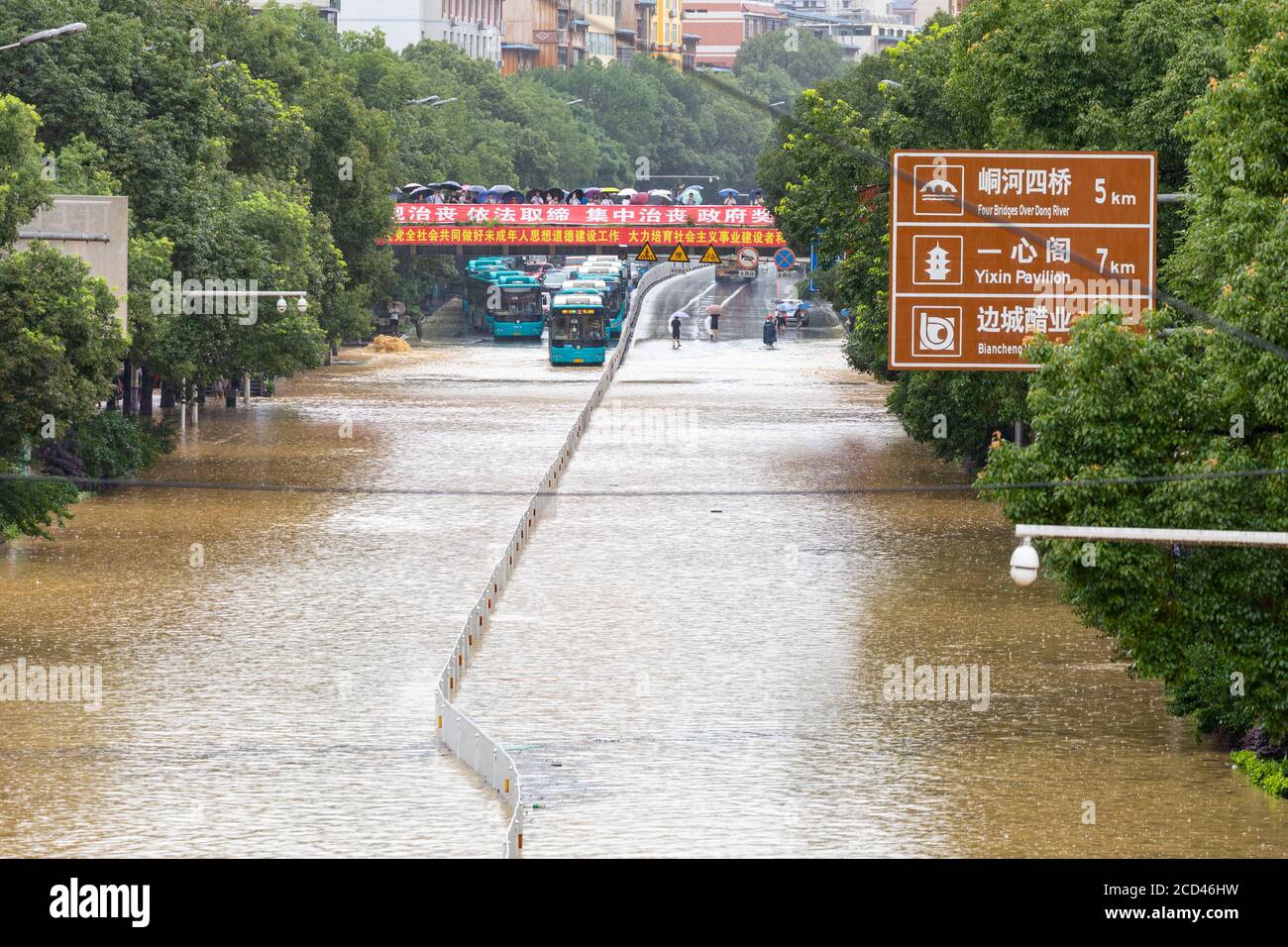 Aerial view of villages and road flooded by heavy rainfall in Xiangxi ...