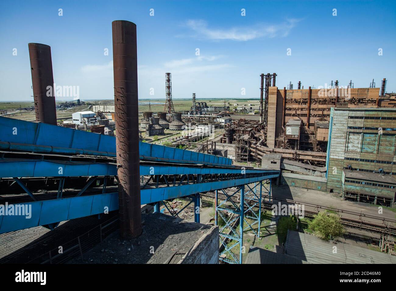 Abandoned soviet metallurgy factory buildings with broken windows and ...